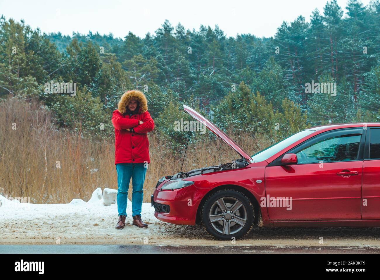 man standing near broken car at roadside snowed winter weather Stock ...