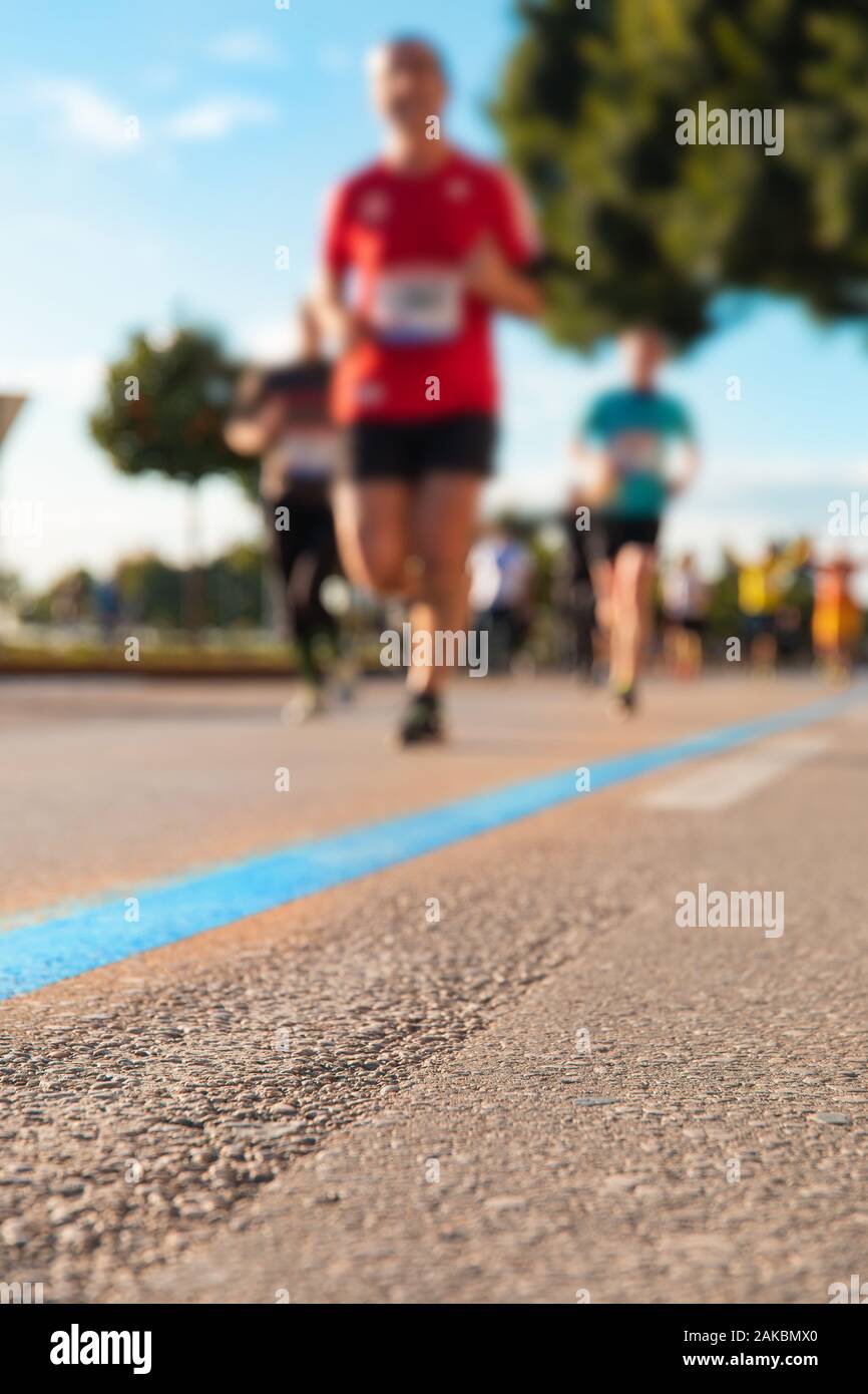 Male Female Athletes Running Marathon Race High Resolution Stock ...