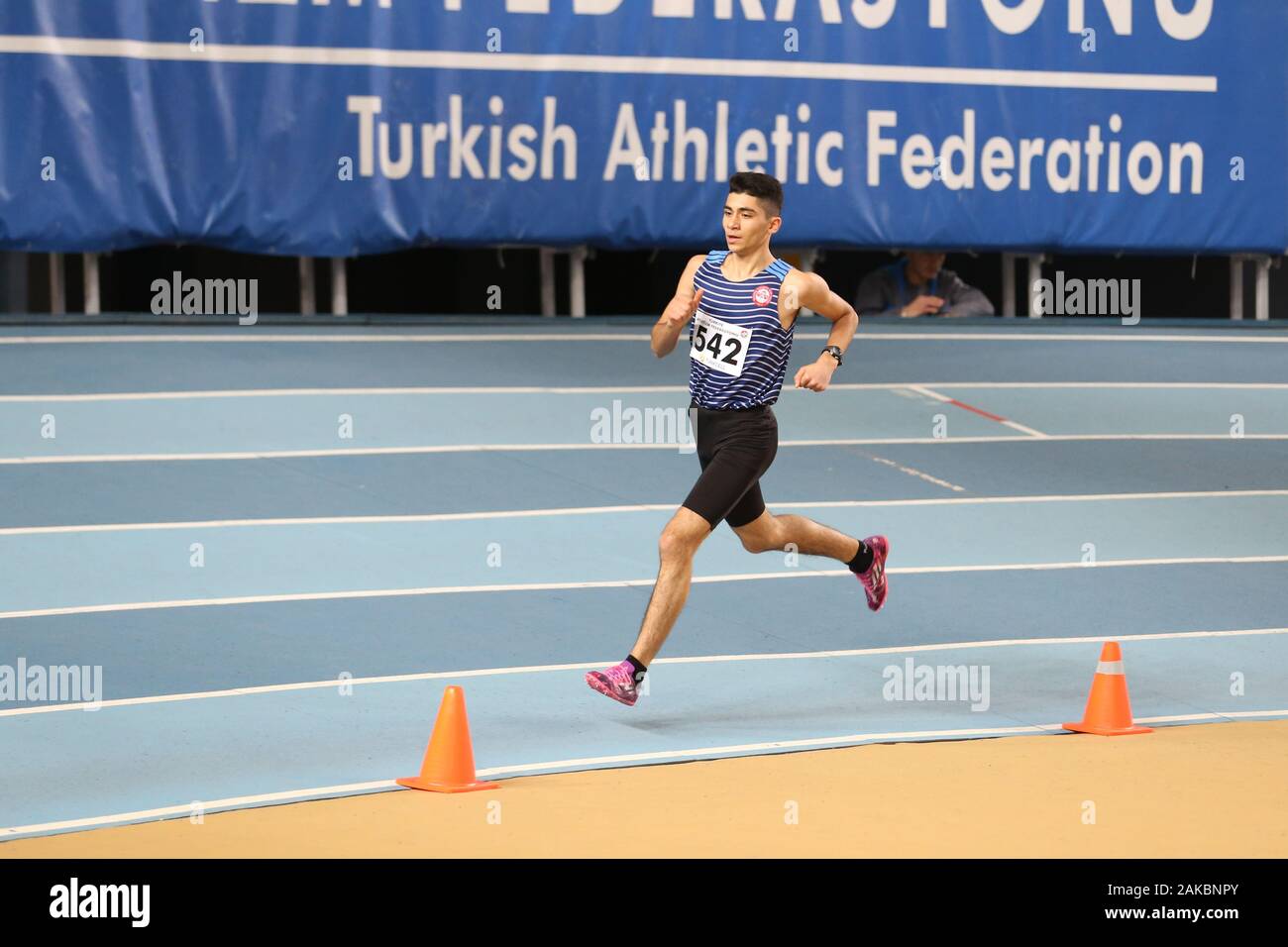 ISTANBUL, TURKEY - DECEMBER 22, 2019: Undefined athlete running during ...