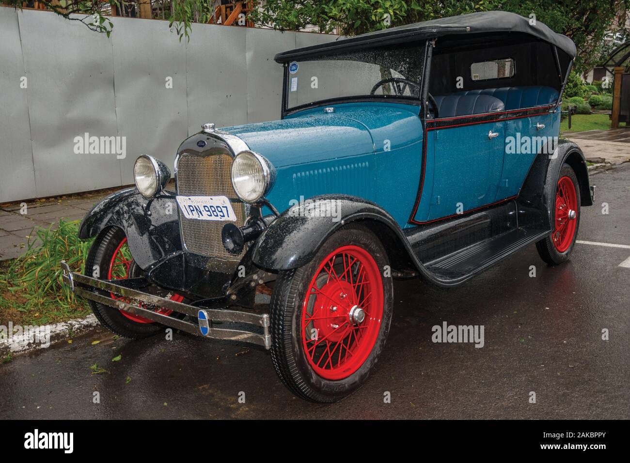 Antique Ford 1929 car in perfect condition, parked on a rainy day in a ...