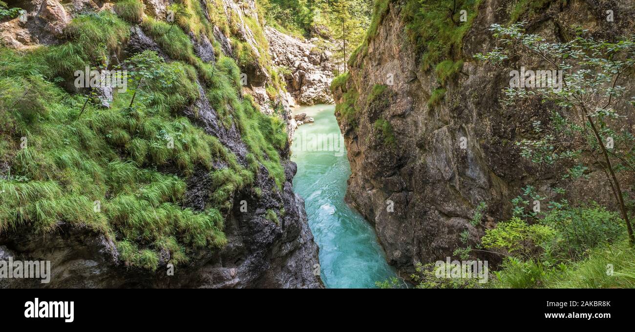 Panorama of a narrow gorge with beautiful blue streaming water in the ...