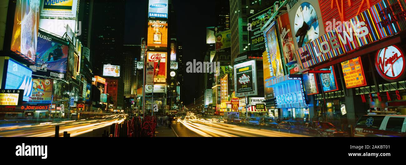 Neon boards in a city lit up at night, Times Square, New York City, New ...