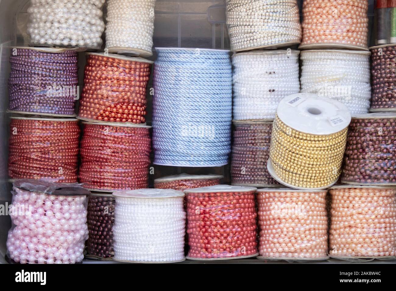 Spools of beads. Different colors and varieties. Decorations are used ...