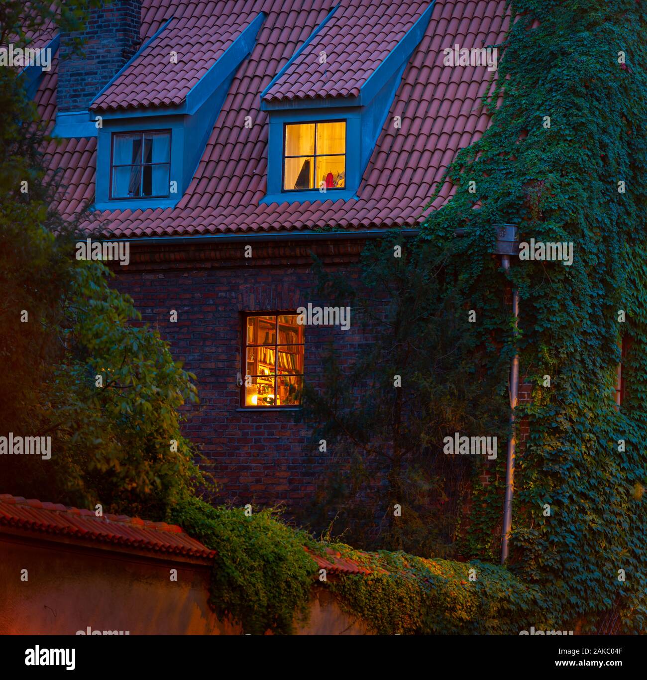 Old town house in Dresden, Germany at night, Europe. Warm light from ...