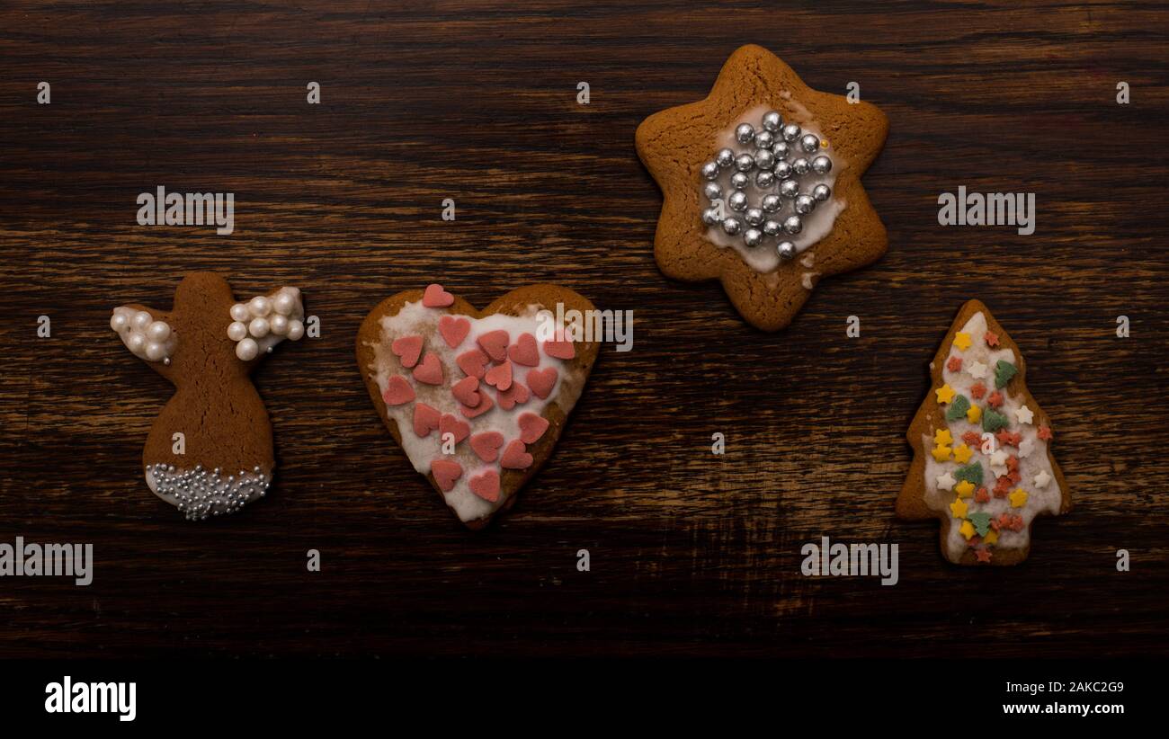 homemade gingerbread of various shapes with white icing and colorful ...