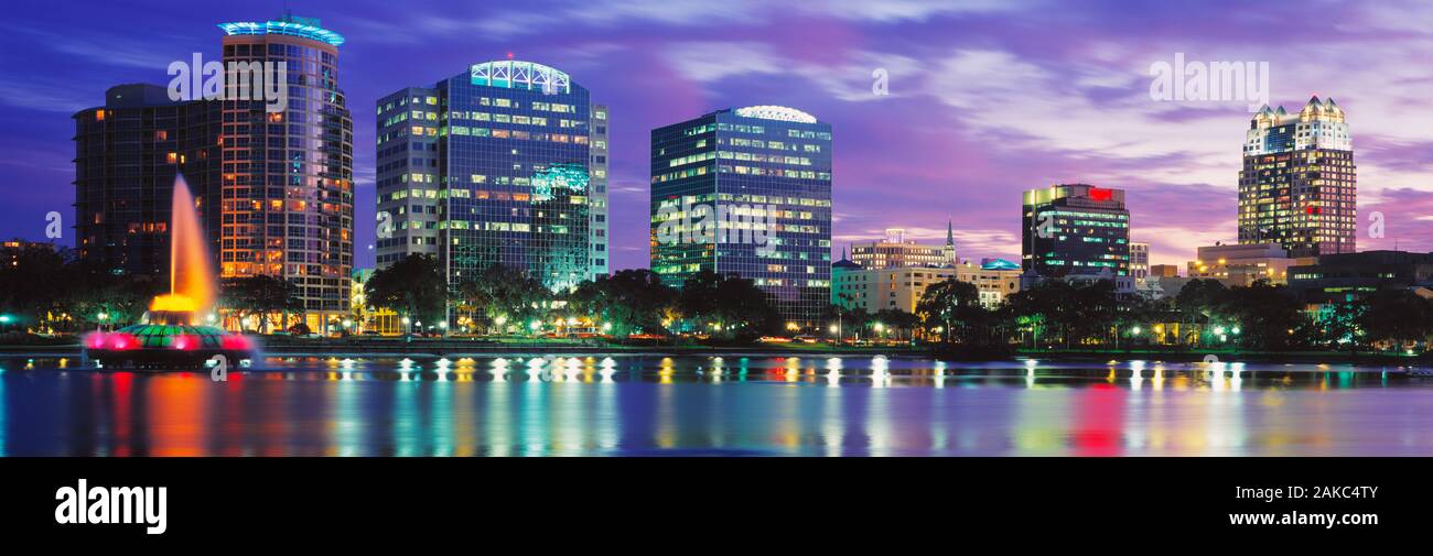 Panoramic View Of An Urban Skyline At Night, Orlando, Florida, USA ...