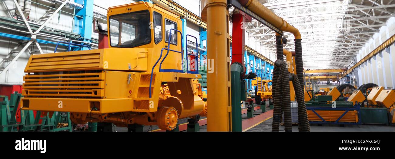 Half ready heavy truck standing at end of production line Stock Photo ...