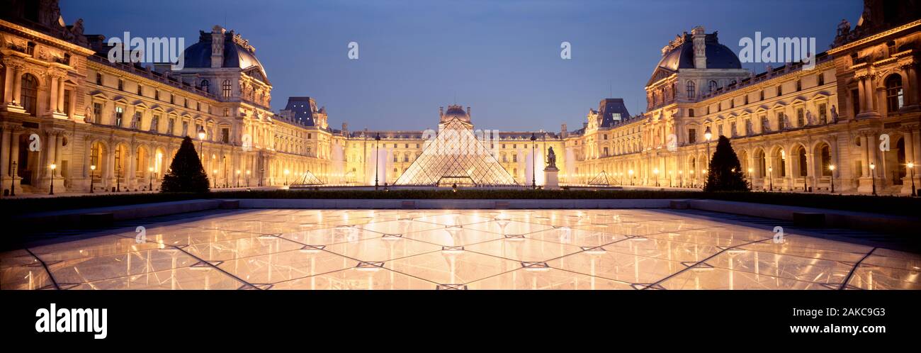 Light Illuminated In The Museum, Louvre Pyramid, Paris, France Stock ...