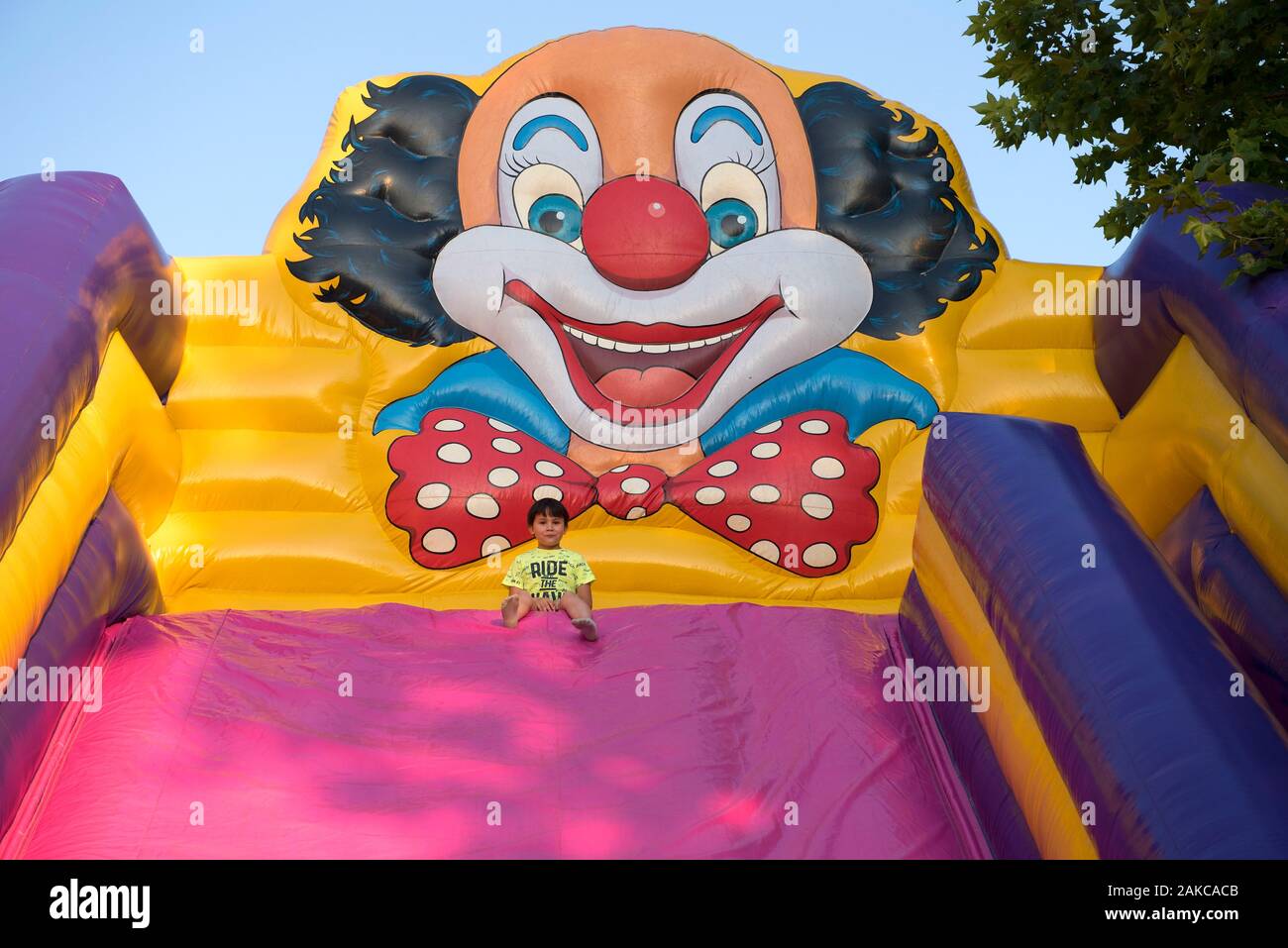 Playing on slider hi-res stock photography and images - Alamy