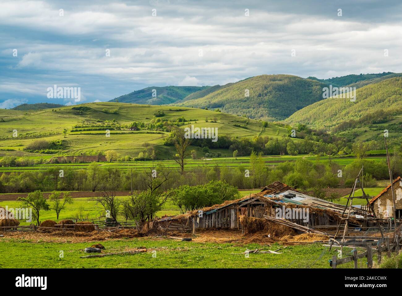 Romania, Transylvania, Oravita, a farm in the Transylvanian landscape ...