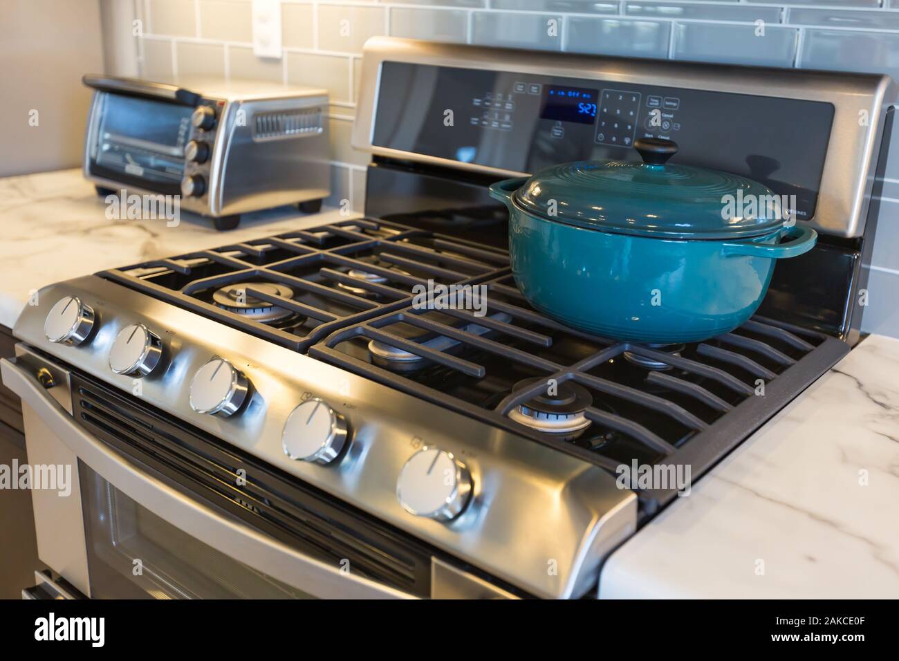 Beautiful Kitchen Stove with Cooking Pot and Toaster Over Stock Photo ...