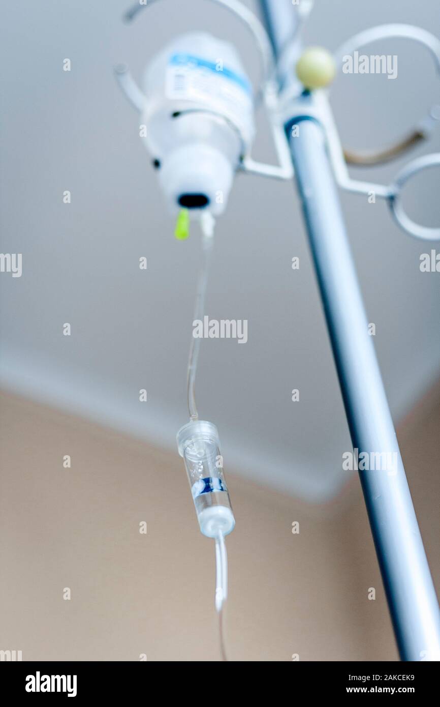 Close-up bottle of medicine on dropper system in the operating room ...