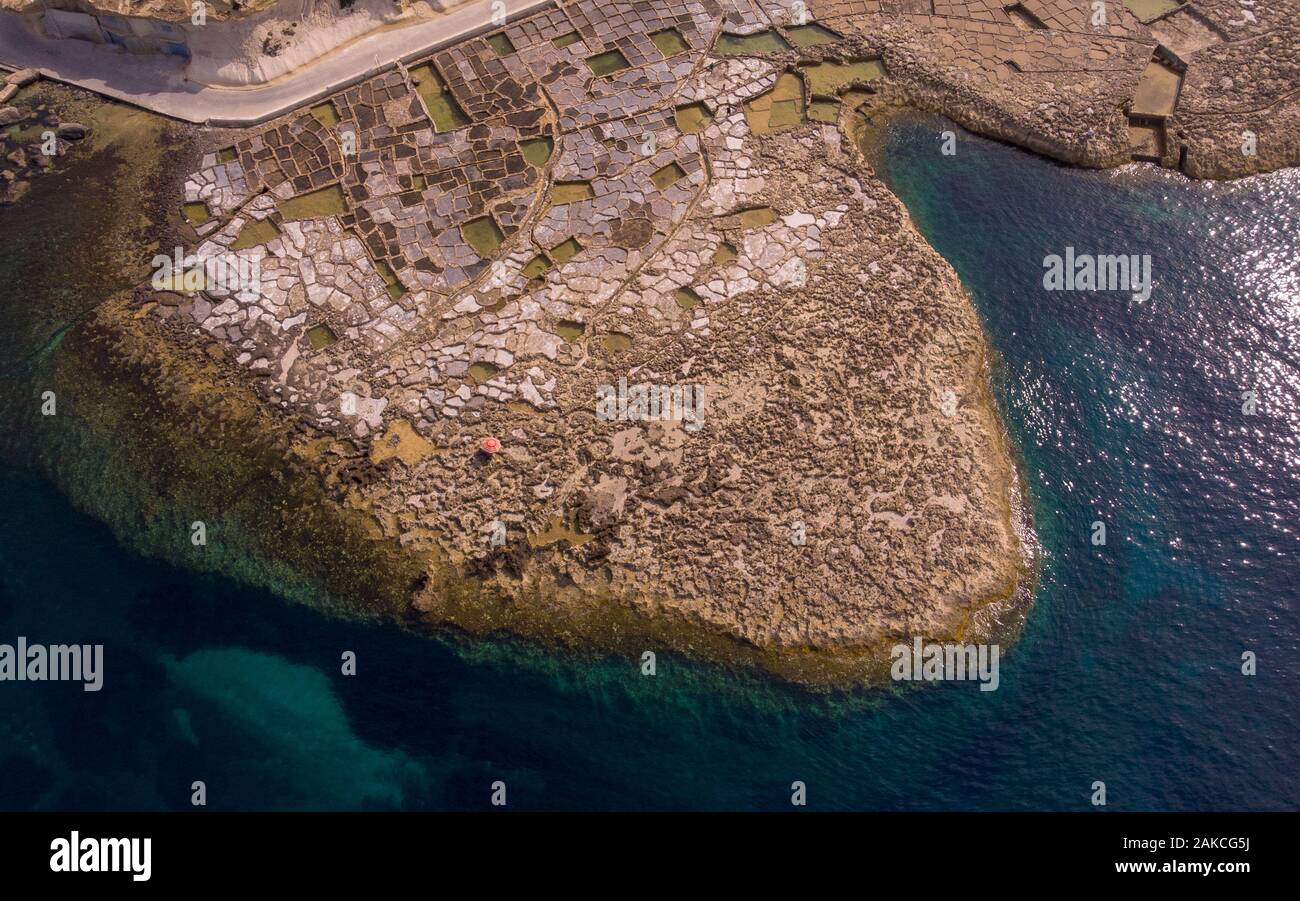 Ancient salt pans on the island of Gozo in Malta are a famous tourist ...