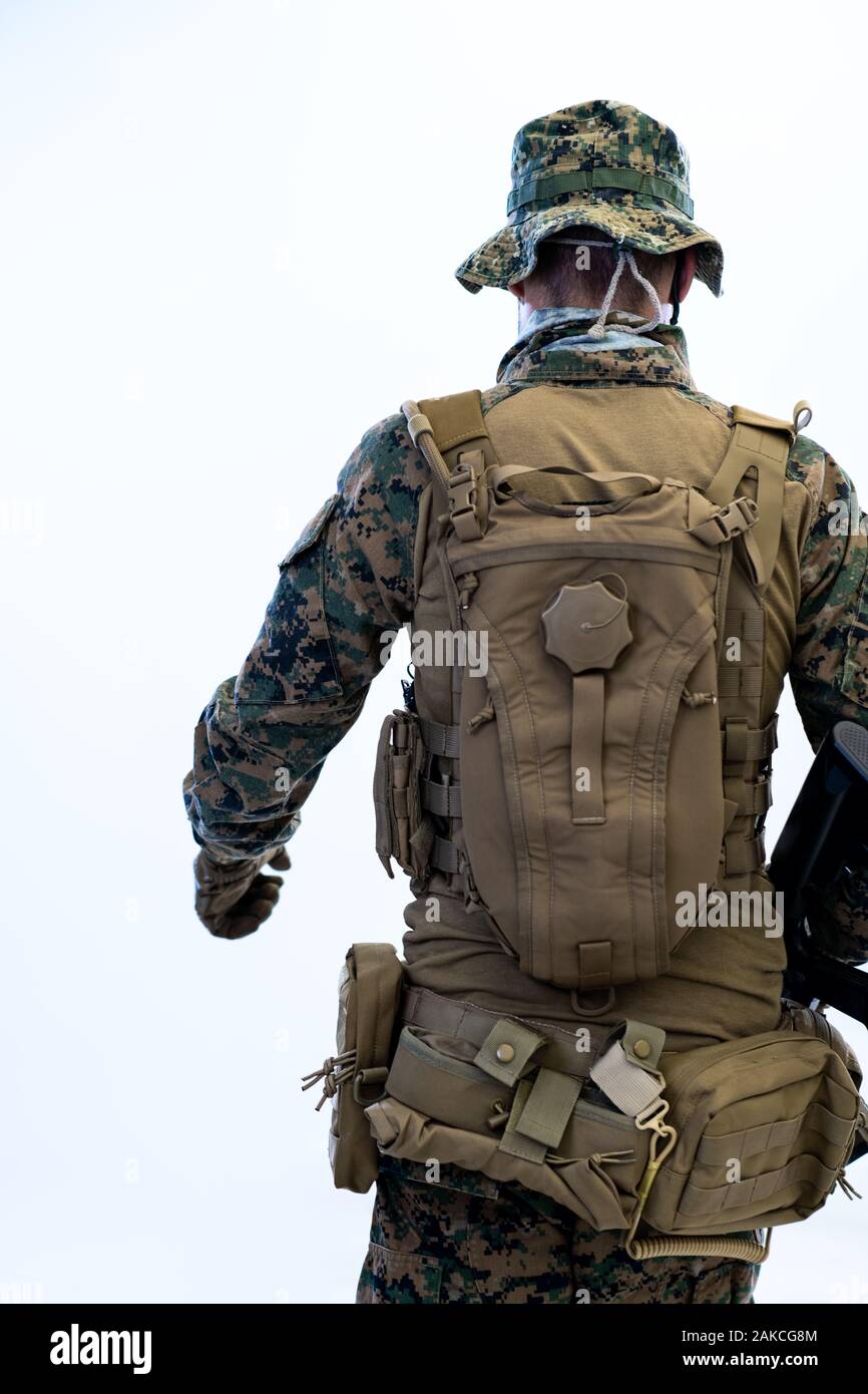 modern warfare soldier going in battle rear view concept of future and ...