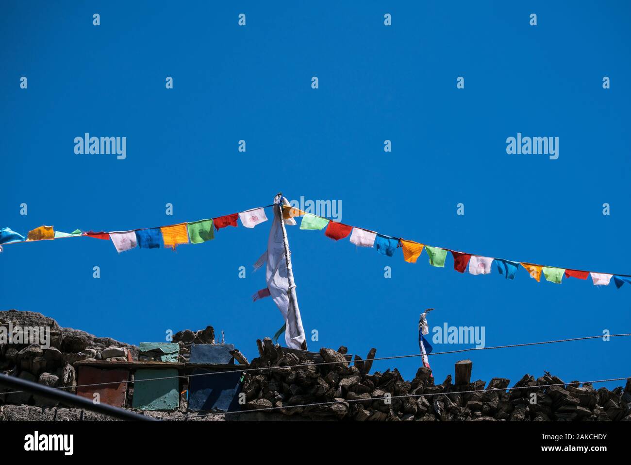 Buddhist prayer flags in Kagbeni village, a bridge between Lower and ...
