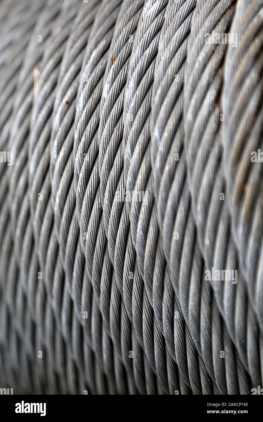 Group of strong thick hanging ropes as background Stock Photo - Alamy