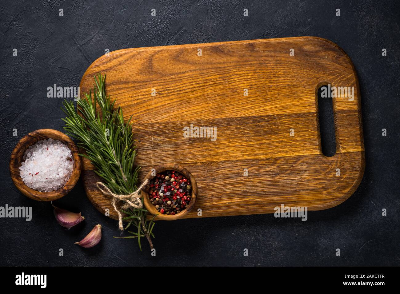 Food cooking background with herbs and spices on black Stock Photo - Alamy