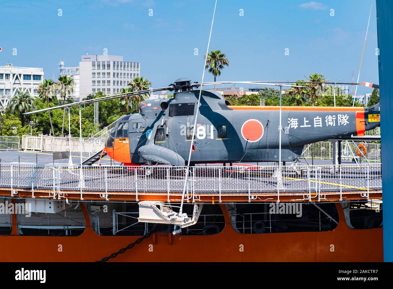 7.08.2018 Japan Nagoya.Cargo ship in the port.Helicopter on a cargo box ...