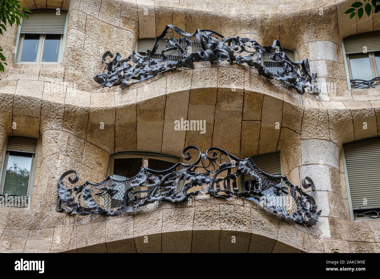 Balconies with ornate wrought iron balustrades on the 1912 Casa Mila ...