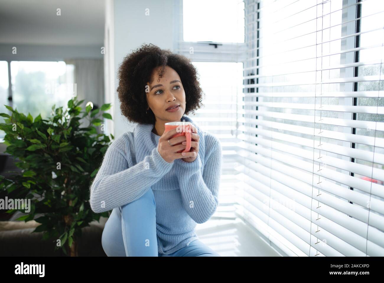 Gen woman drinking cup hi-res stock photography and images - Alamy