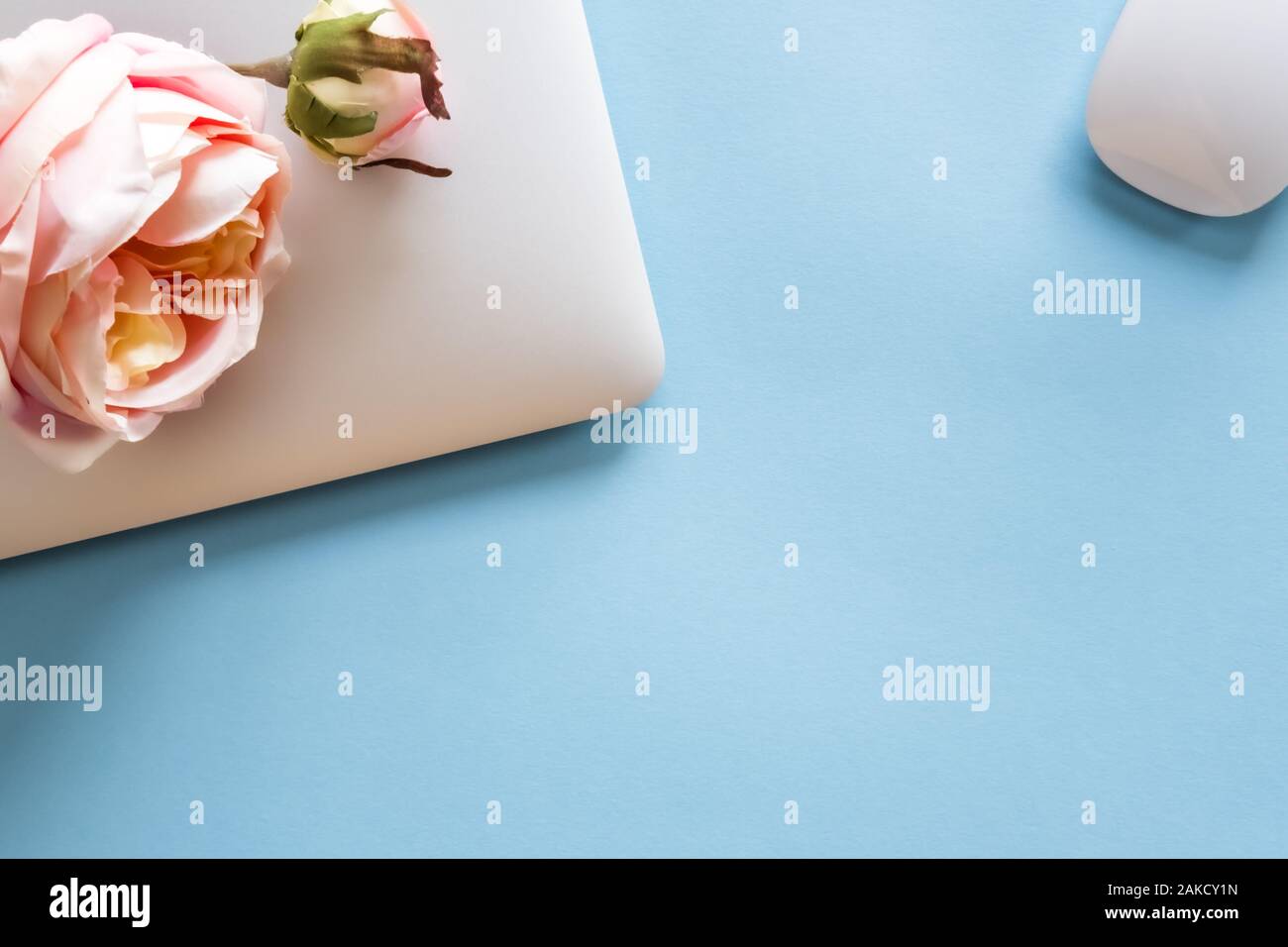 Laptop and flowers Stock Photo - Alamy