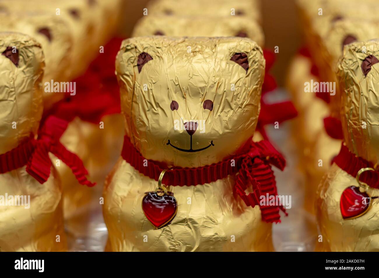 Chocolate teddy bear in a golden wrapper. View from the front Stock ...