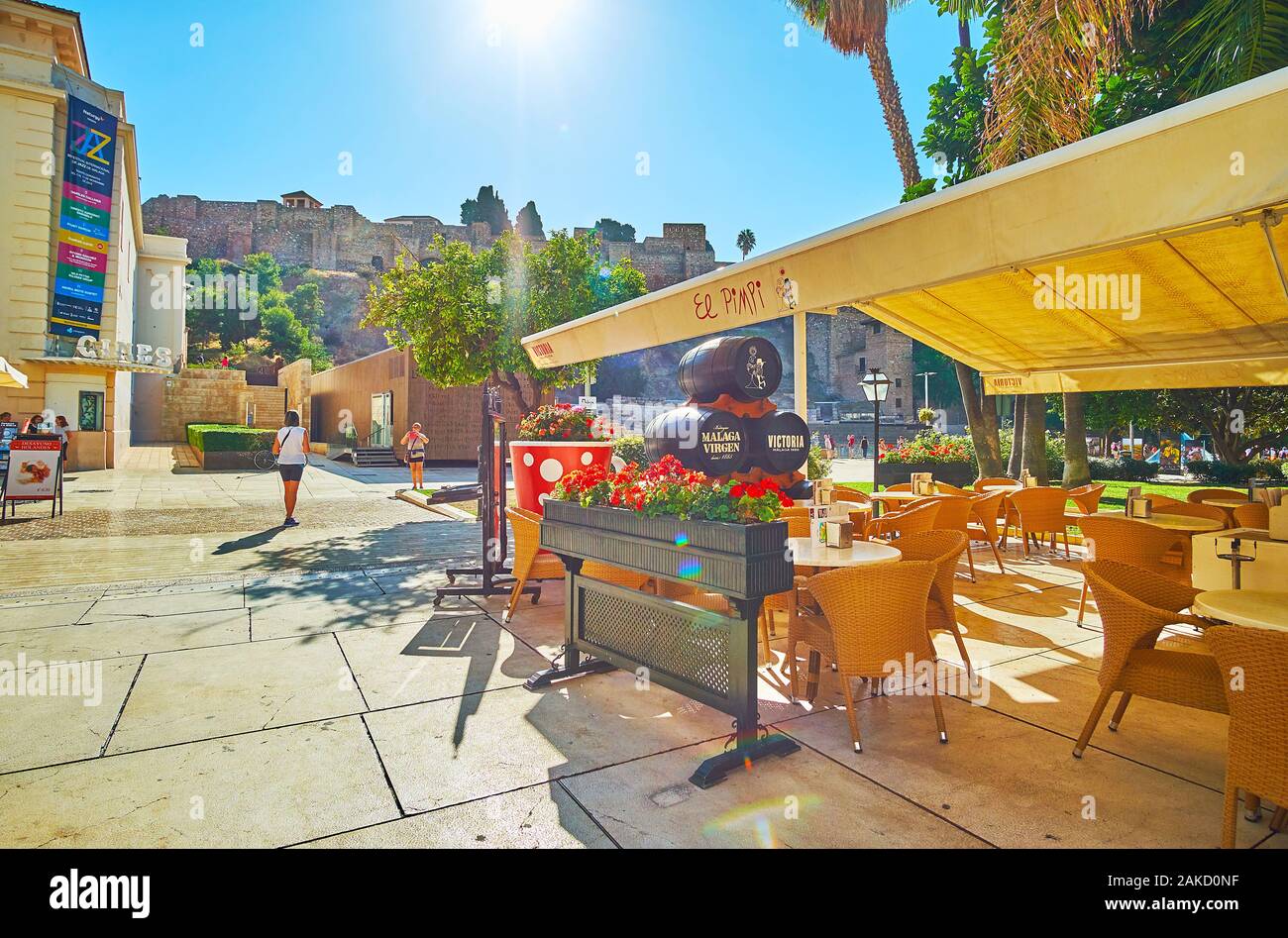 MALAGA, SPAIN - SEPTEMBER 26, 2019: The cozy outdoor cafe with vine ...