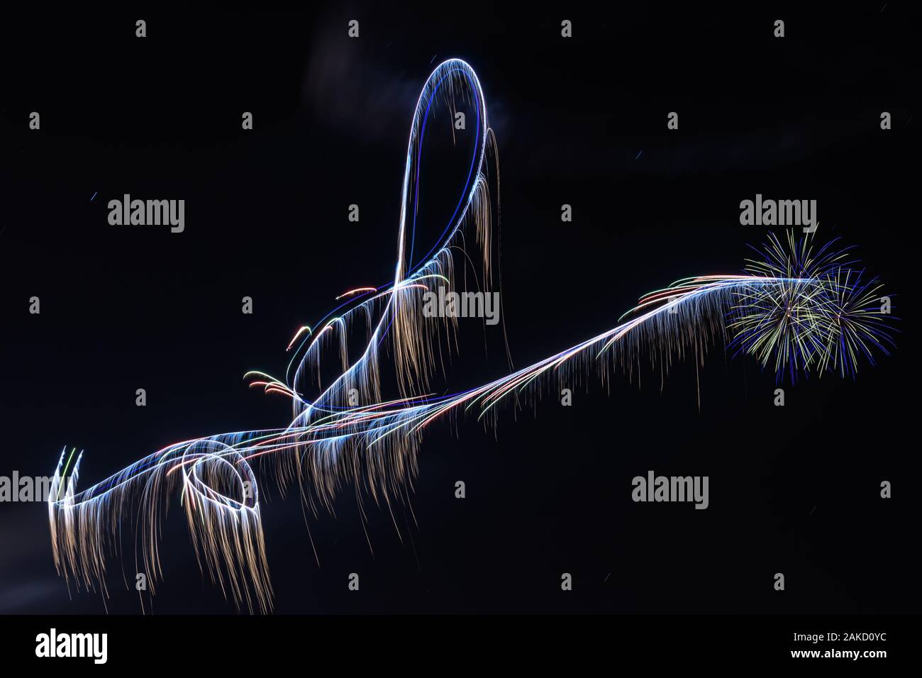 Fireworks and light trails Stock Photo - Alamy