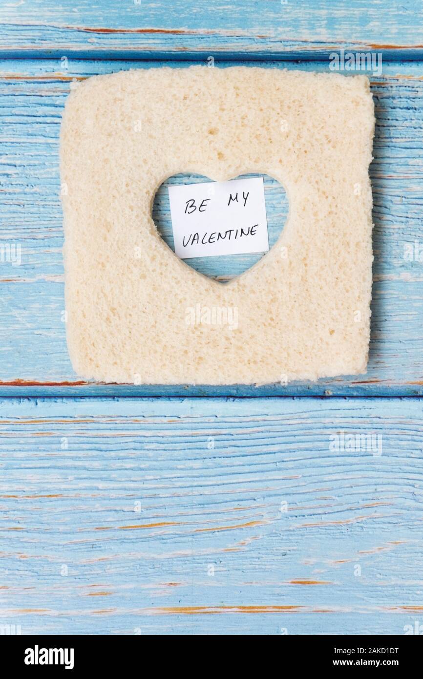 love message inside a sandwich slice with a heart Stock Photo - Alamy