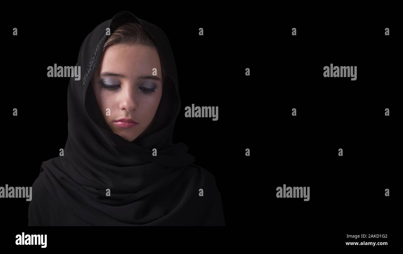 Portrait of arabian woman isolated . Sad arab girl in black abaya and ...