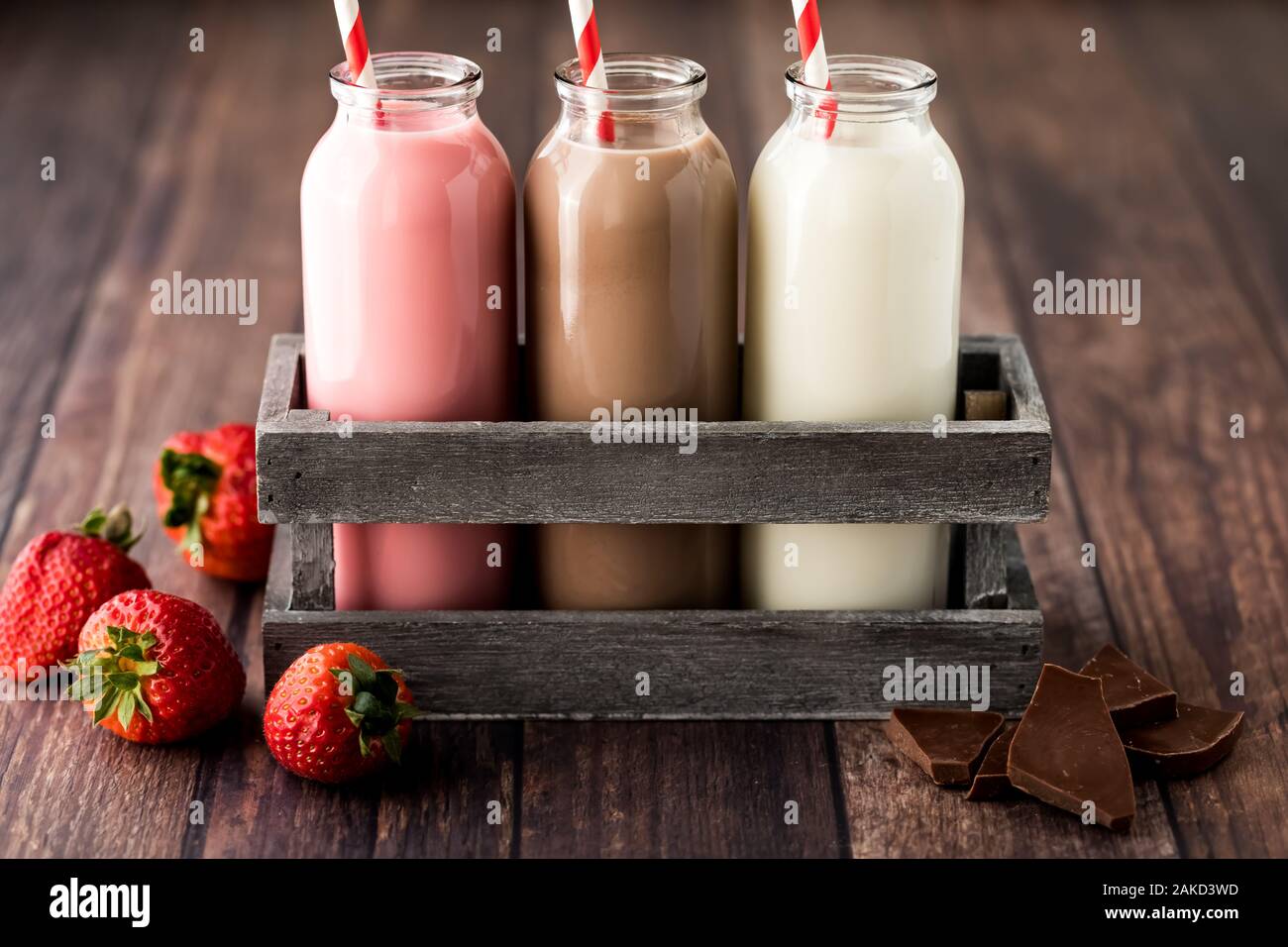 Three bottles of flavoured milk Stock Photo - Alamy