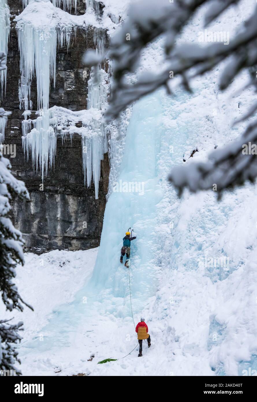 Ice climbers on an icy waterfall Stock Photo - Alamy