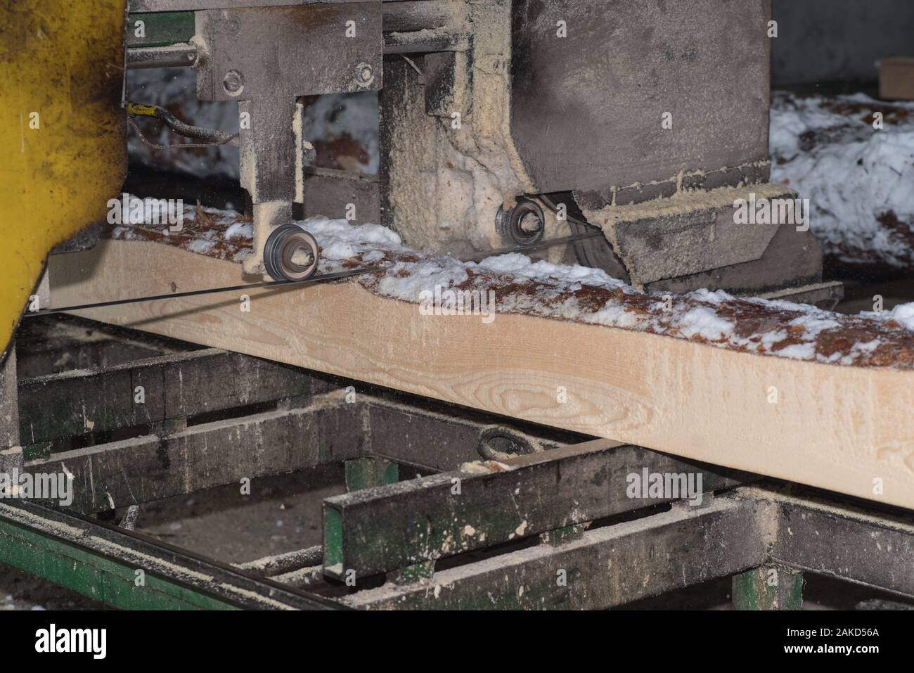 Sawmill. Process of machining logs in equipment sawmill machine saw ...