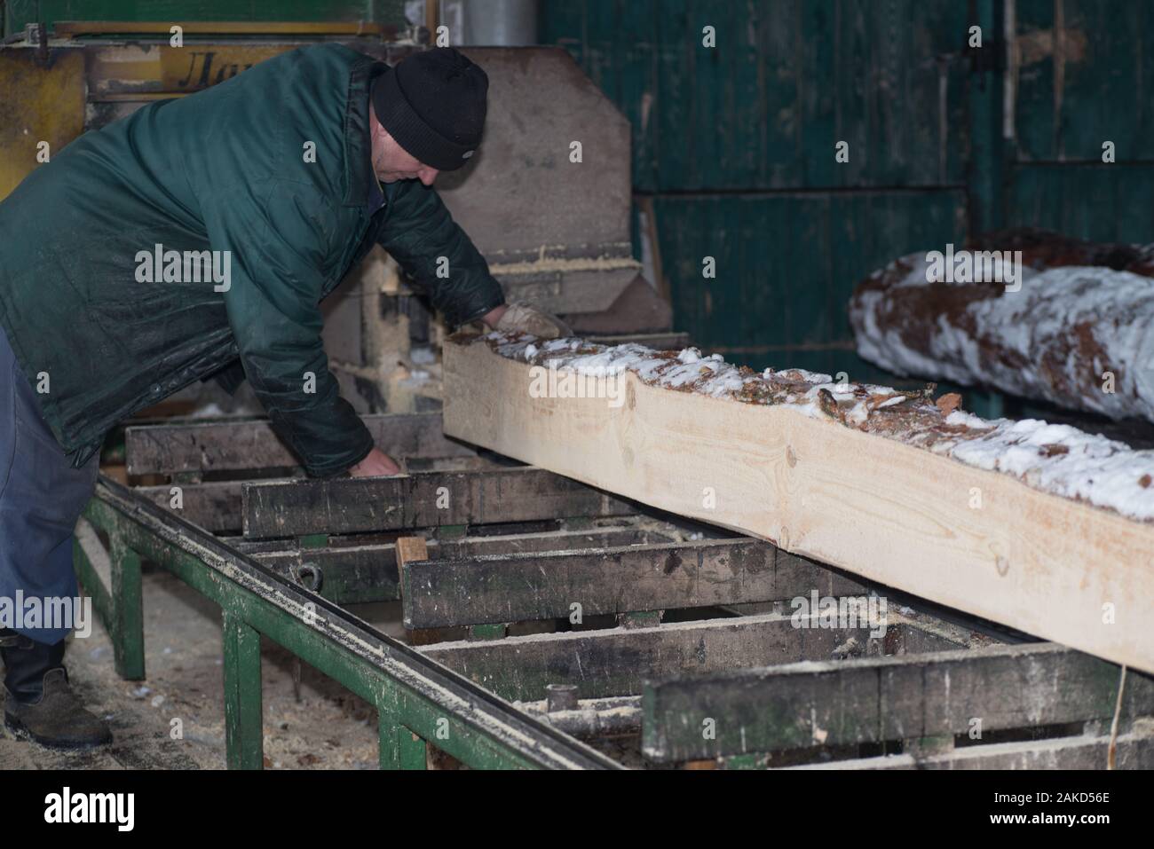 Sawmill. Process of machining logs in equipment sawmill machine saw ...