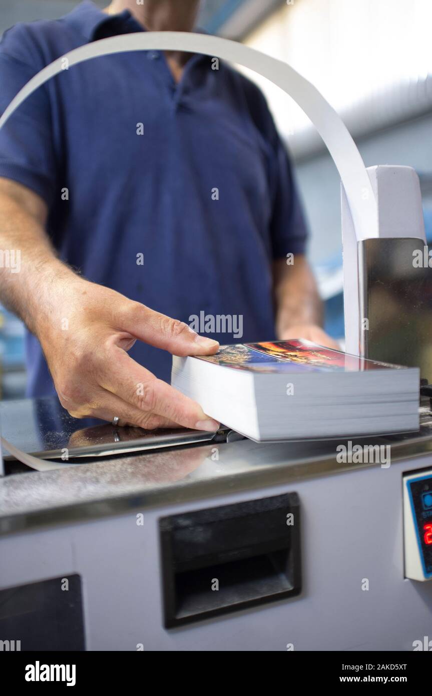 compact paper banding machine running Stock Photo - Alamy