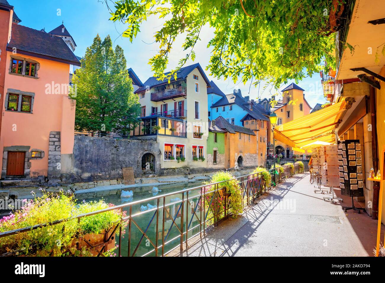 Pedestrian street along to Canal du Thiou in old town Annecy. French ...
