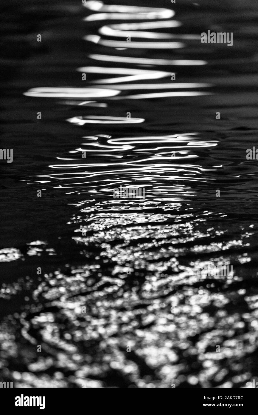 Ripples in water create bold, abstract lines Stock Photo - Alamy