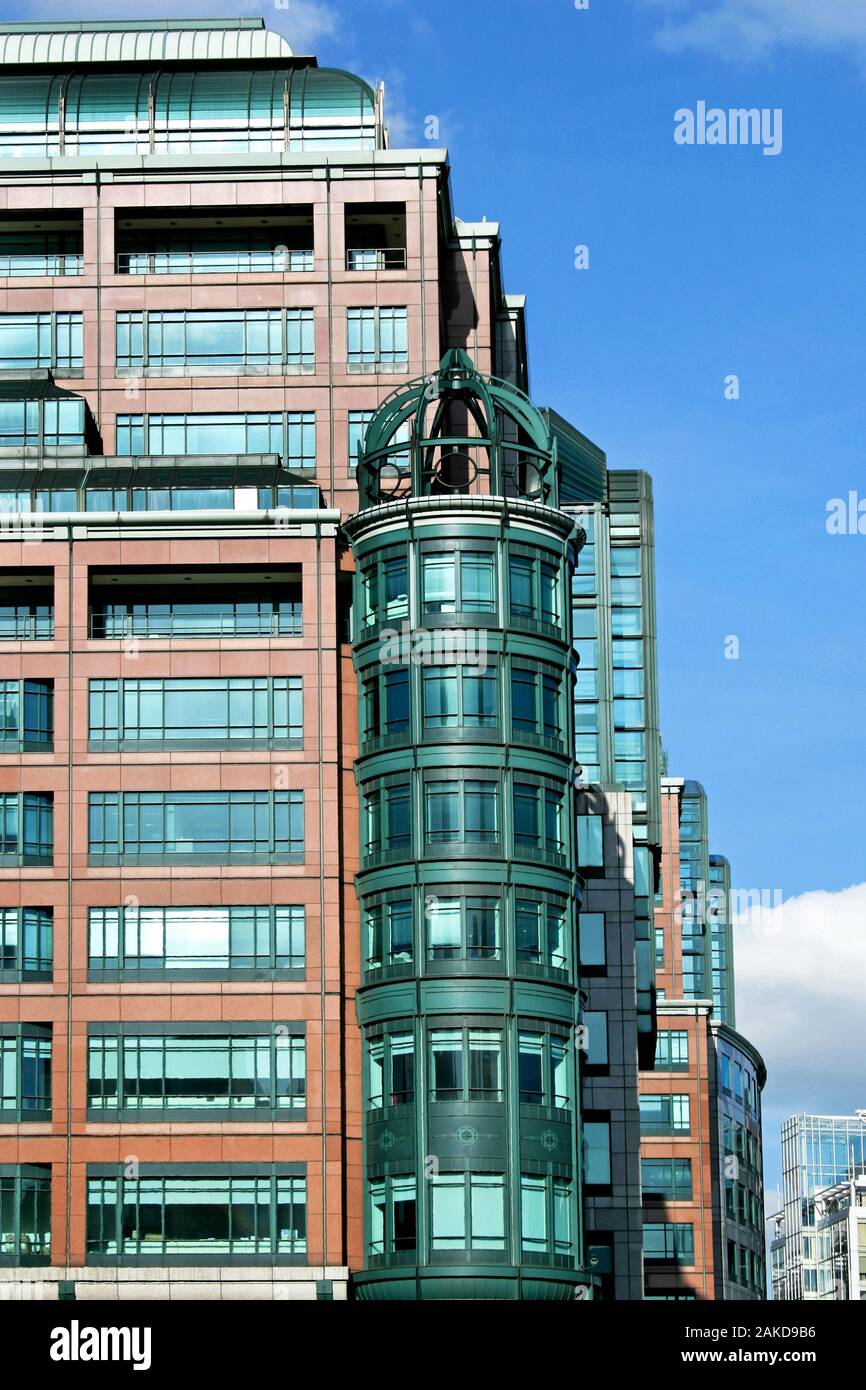 Modern commercial business building on the corner Stock Photo - Alamy