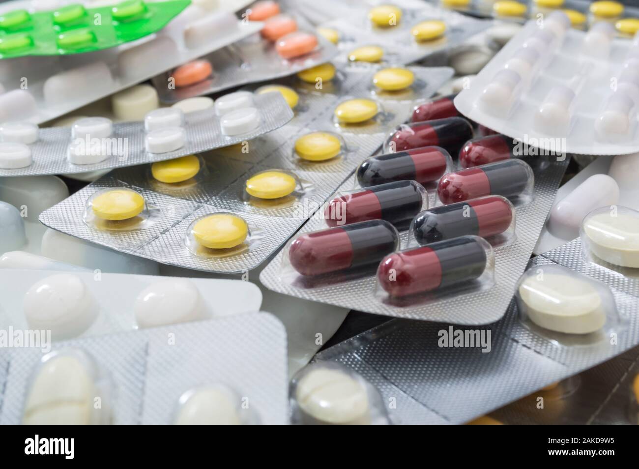 Pharmaceutical medicine pills, tablets and capsules different colors ...
