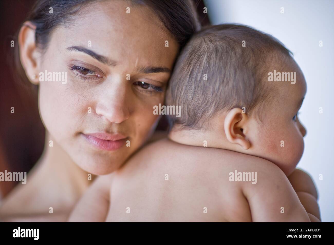 Young parents holding photos hi-res stock photography and images - Alamy