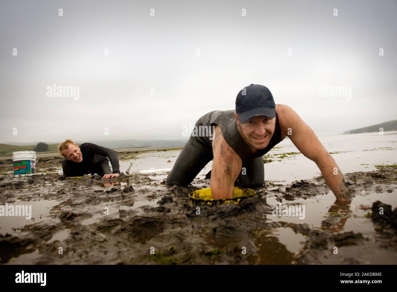 2 people on a beach fishing hi-res stock photography and images - Alamy