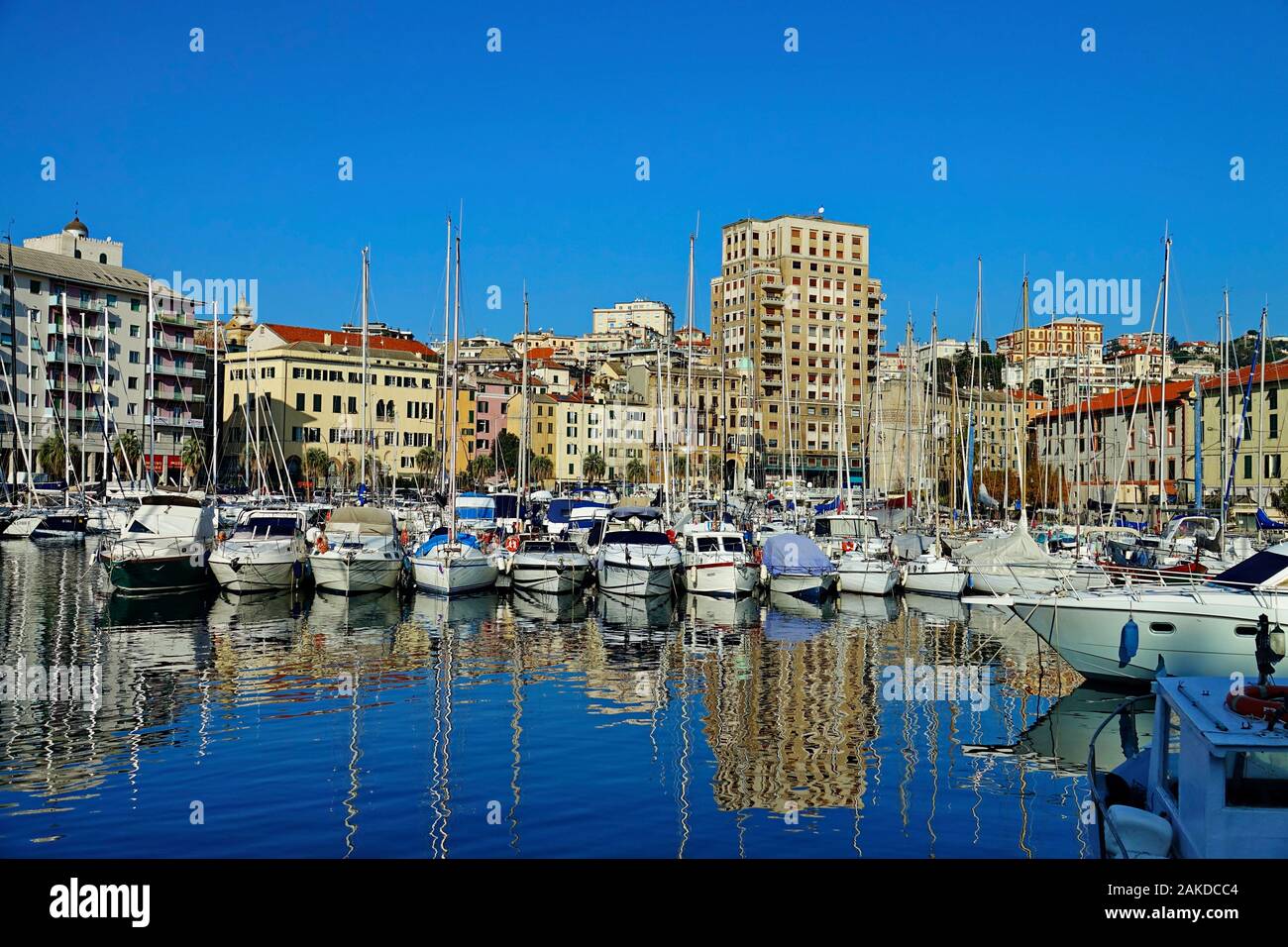 Cityscape of Savona and sailing boats in the port. Savona, Italy ...