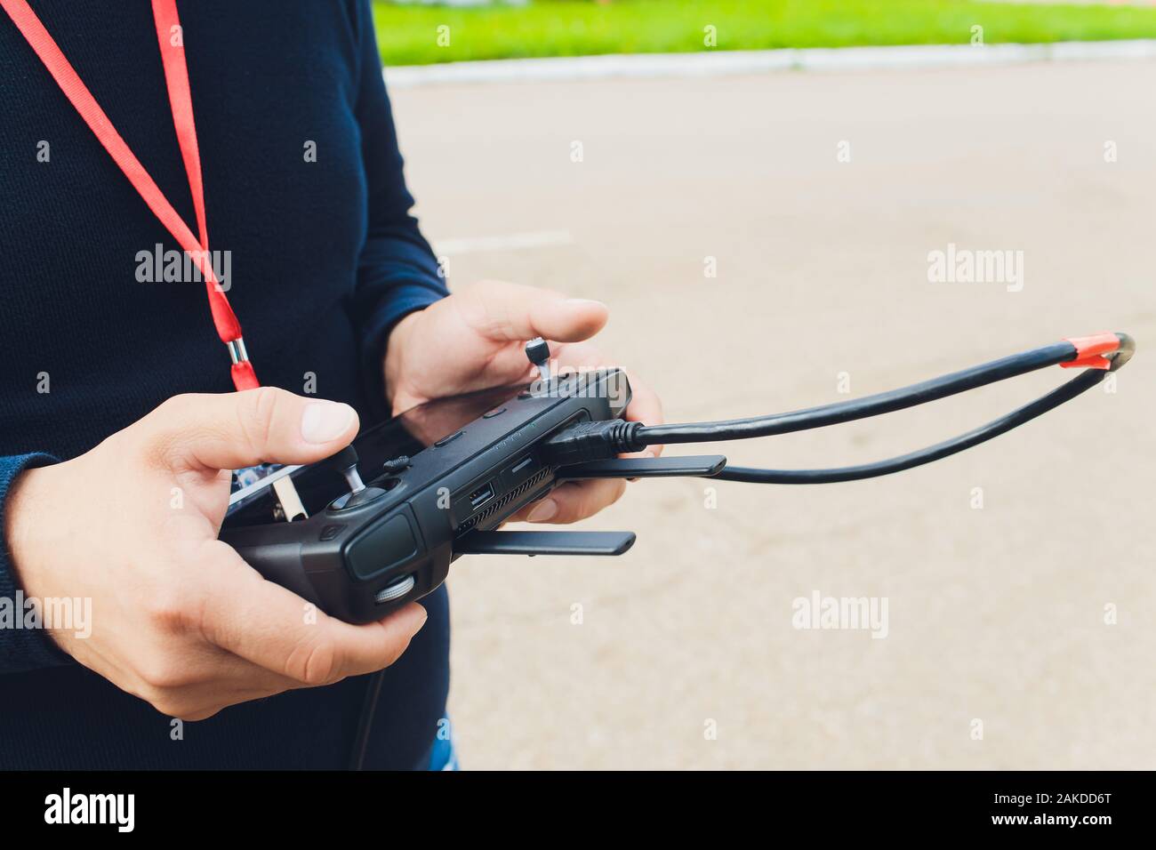 Drone remote control in hand man.Man operating of flying drone Stock ...