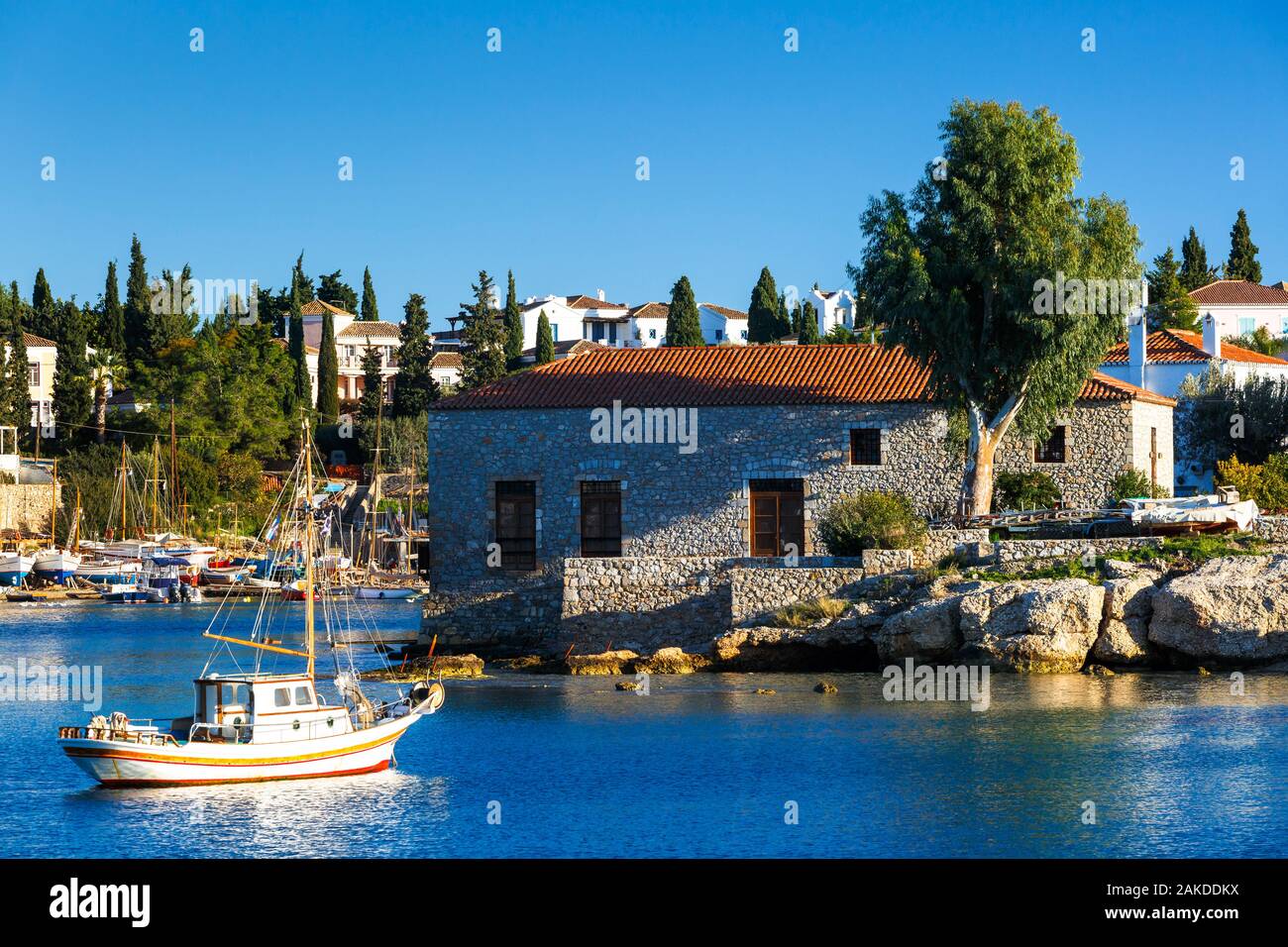 View of traditional architecture in harbour of Spetses village, Greece ...