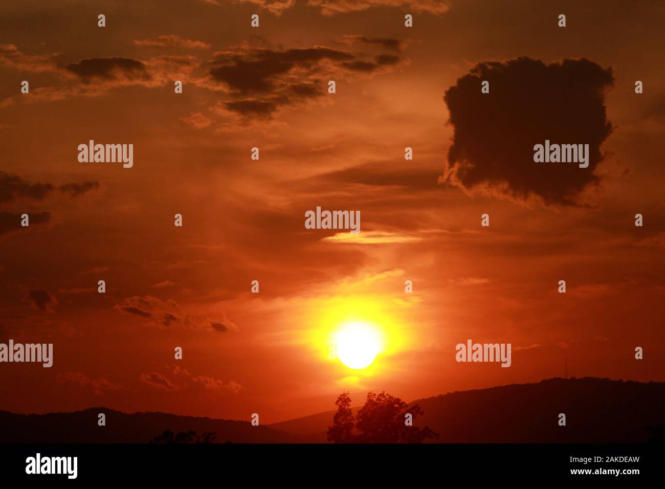 Clouds on a sunset sky Stock Photo - Alamy