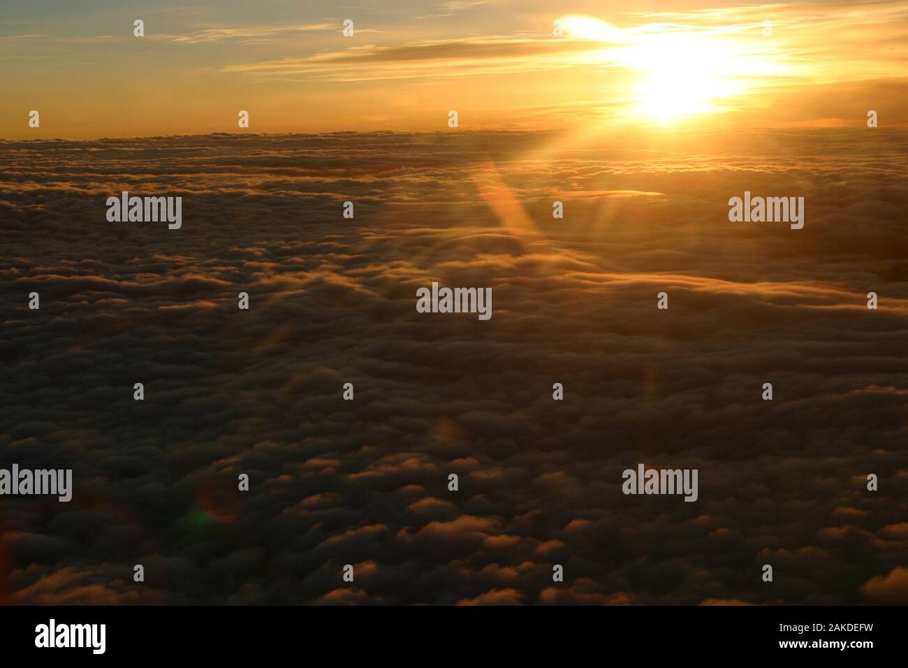 Airplane flying dramatic sunset sky hi-res stock photography and images ...