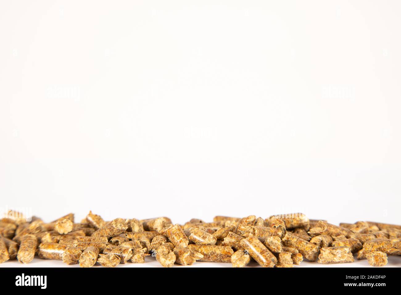 Pile of compressed wood pellets. Ecological renewable biofuel Stock ...