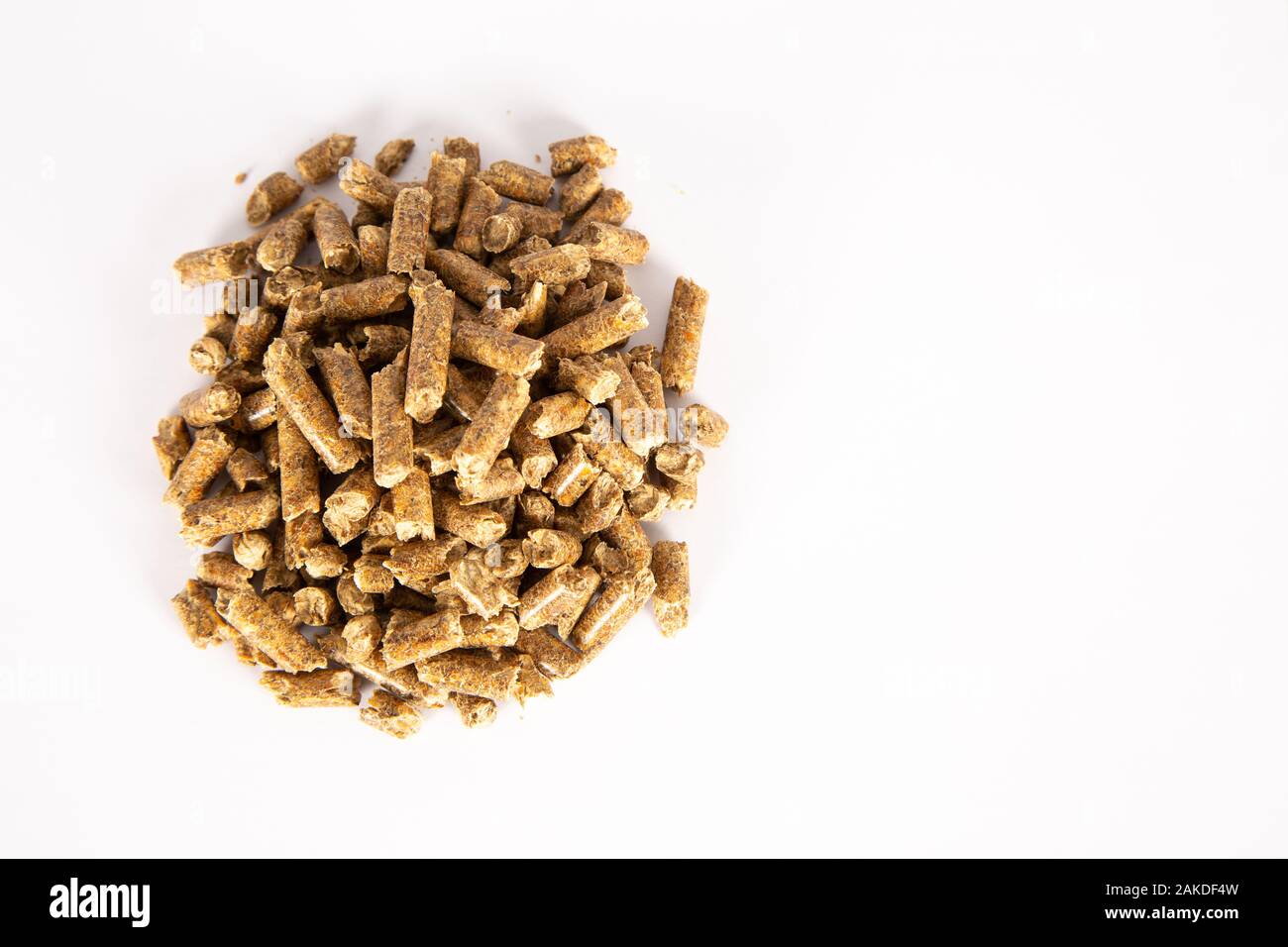 Pile of compressed wood pellets. Ecological renewable biofuel Stock ...