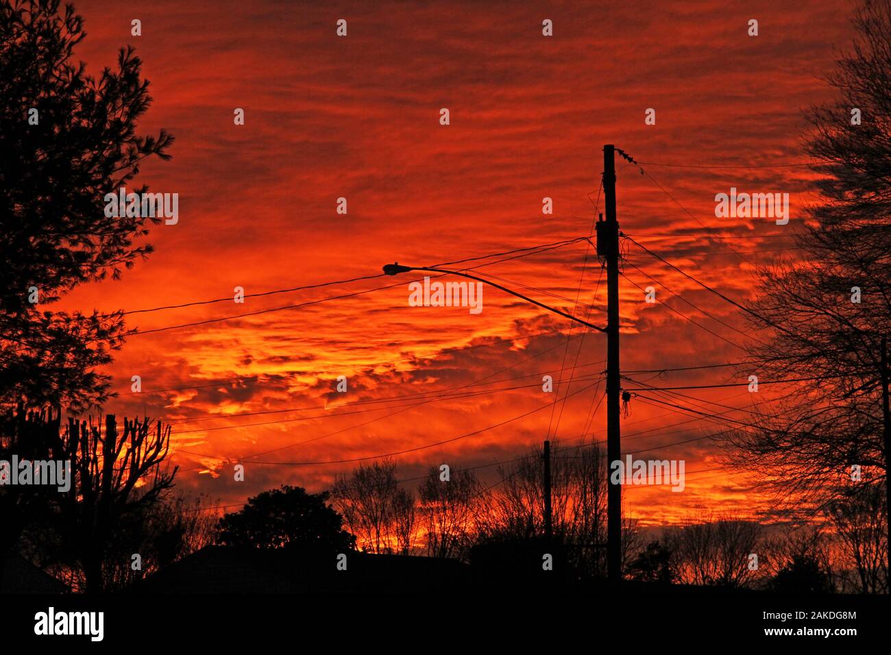 Spectacular sunset sky over the city Stock Photo - Alamy