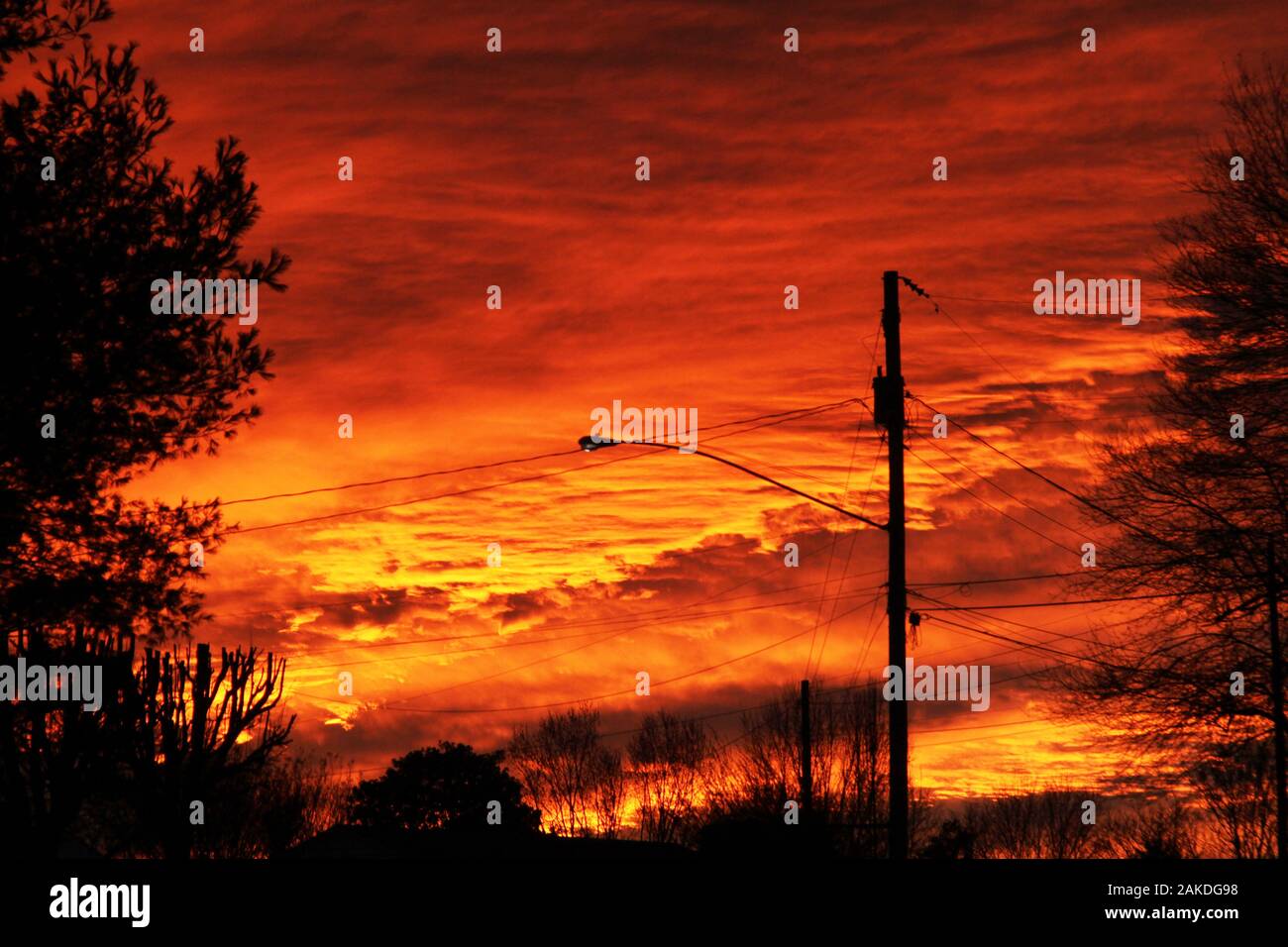 Spectacular sunset sky over the city Stock Photo - Alamy